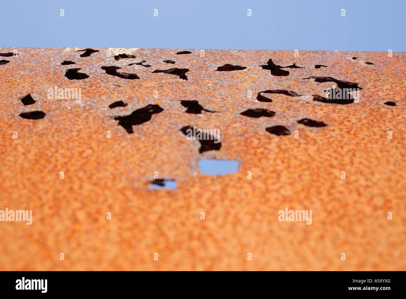 rust holes in damaged metal Stock Photo - Alamy