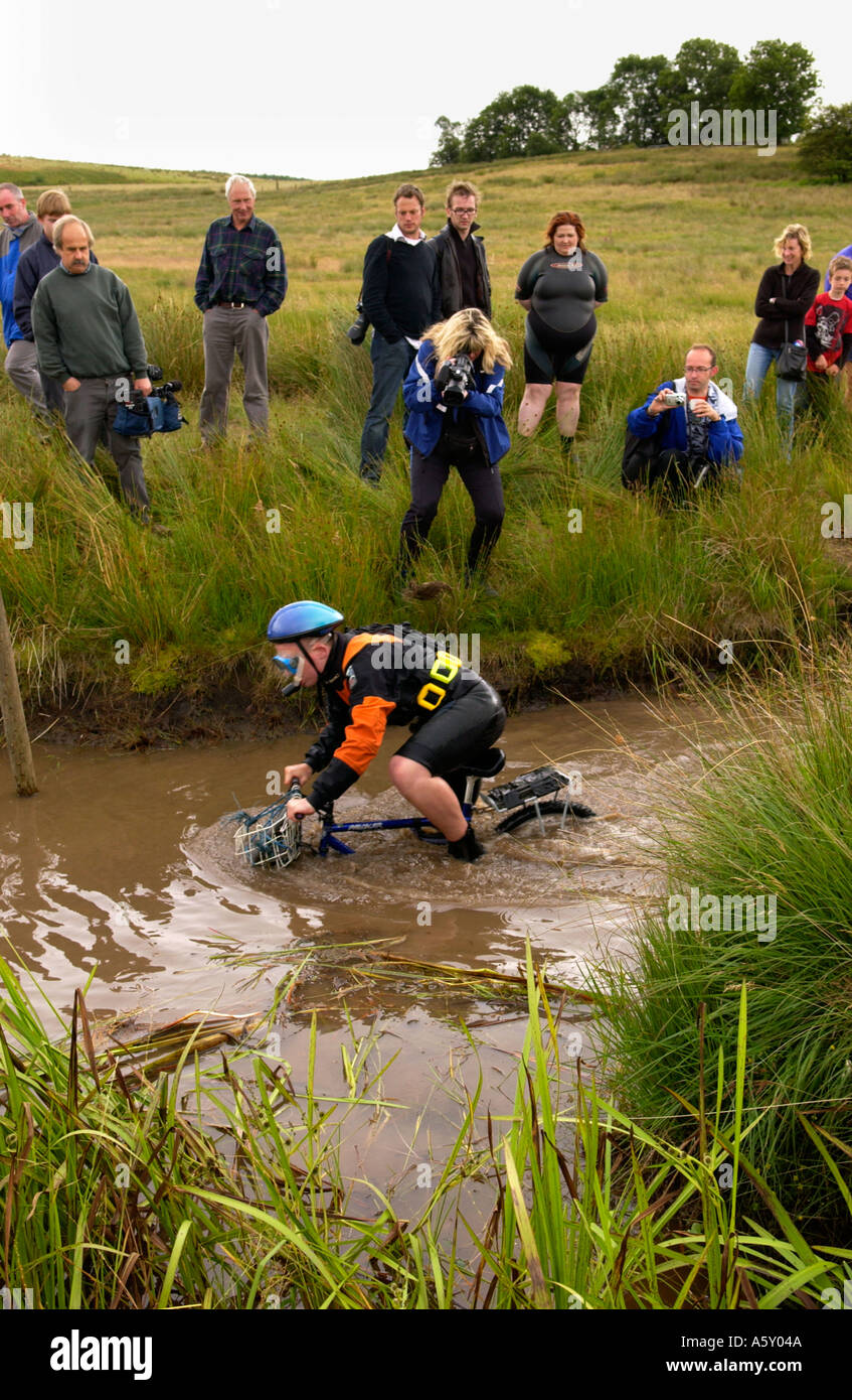Competitor in the annual World Mountain Bike Bog Snorkelling ...