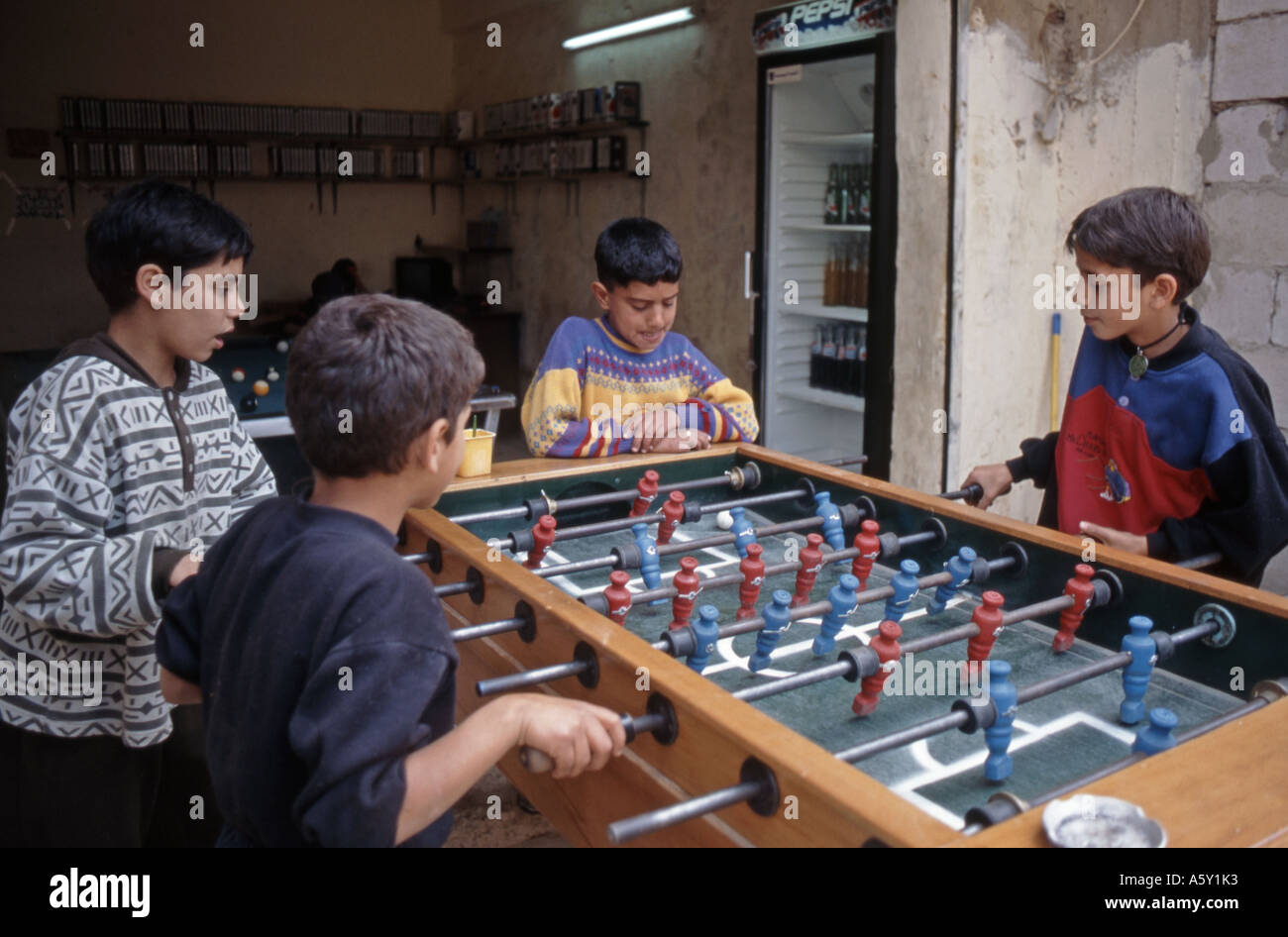 Palestinian children playing baby foot in Chatila Camp Beirut Lebanon ...