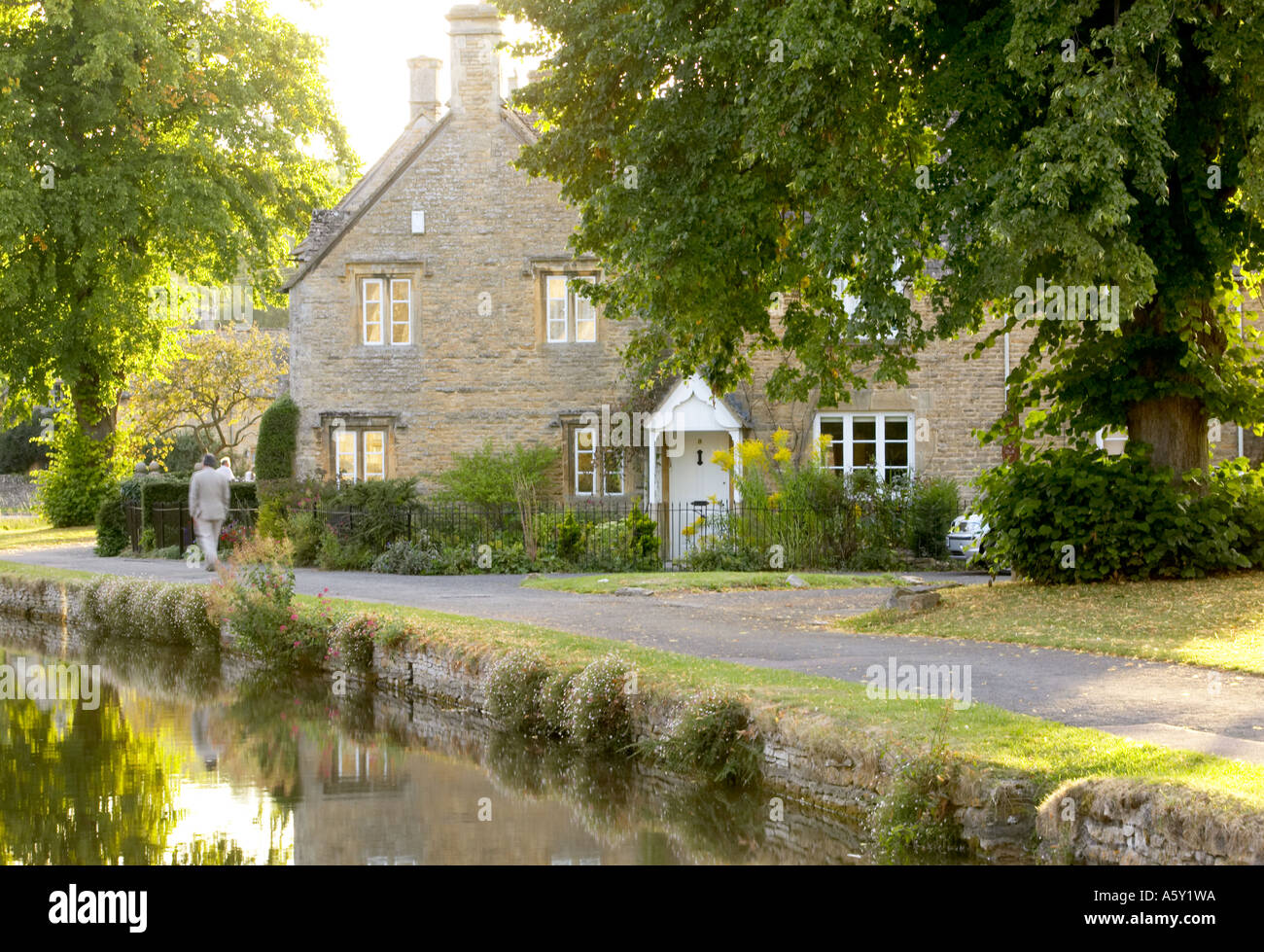 Evening stroll in Lower Slaughter, The Cotswolds, England Stock Photo ...
