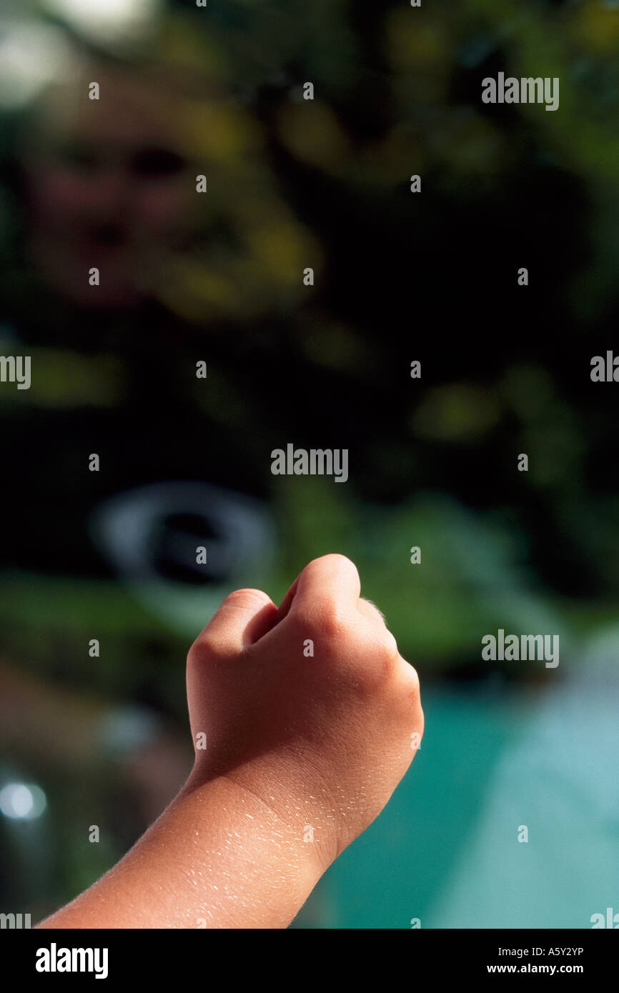 Young childs fist hi-res stock photography and images - Alamy