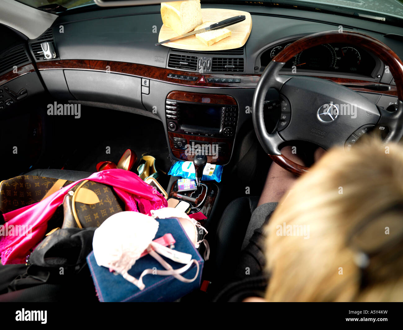Young Woman Living in a Car Model Released Stock Photo - Alamy