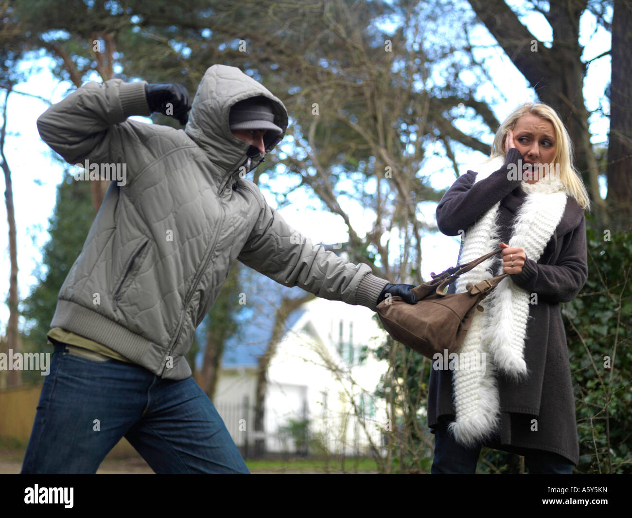 Mugged woman street High Resolution Stock Photography and Images - Alamy