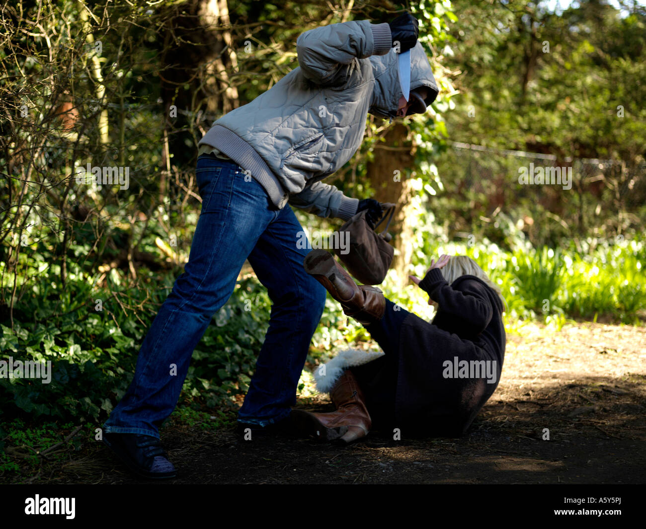 Woman mugged hi-res stock photography and images - Alamy