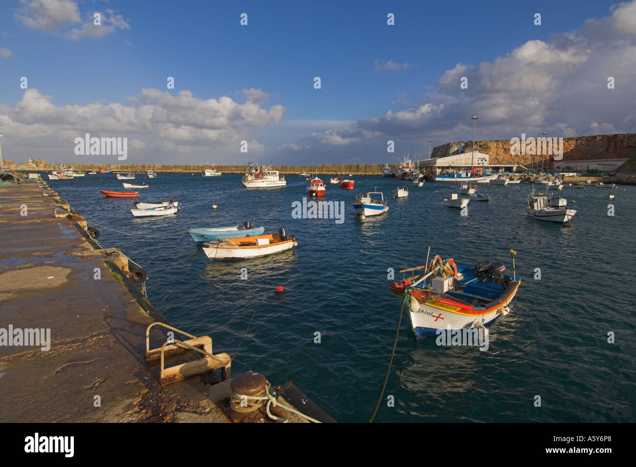 Traditional portuguese wooden fishing boats in Sagres Harbour Algarve ...