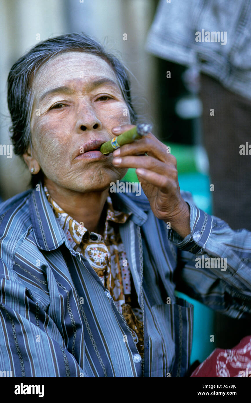 Myanmar Yangon woman smoking Stock Photo - Alamy