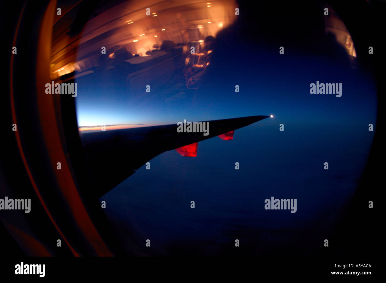 Airplane window view at night Stock Photo - Alamy