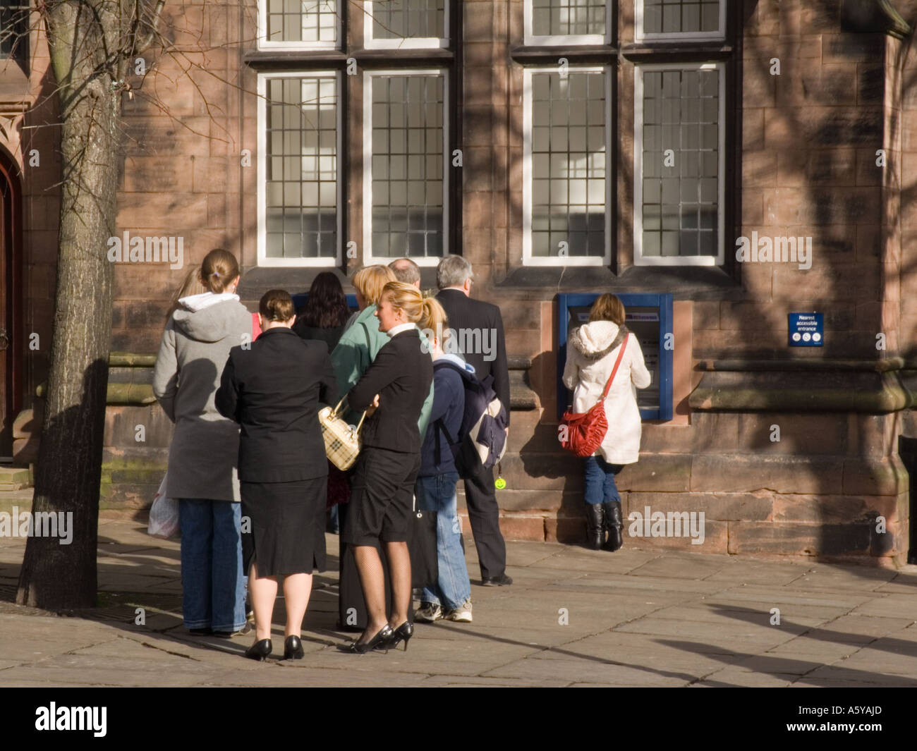 Queueing cash machine hi-res stock photography and images - Alamy