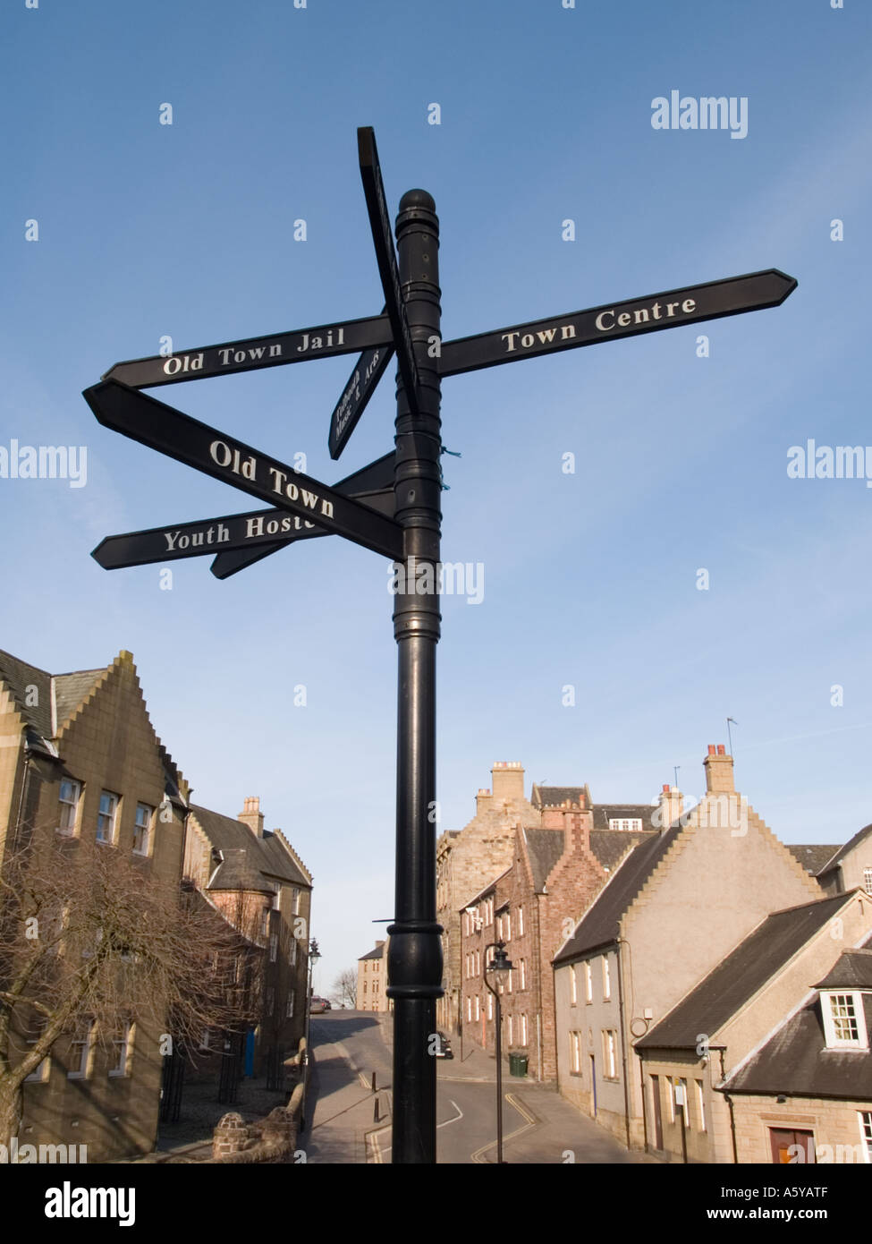 Tourist signpost view St Mary's Wynd with historic buildings on street ...