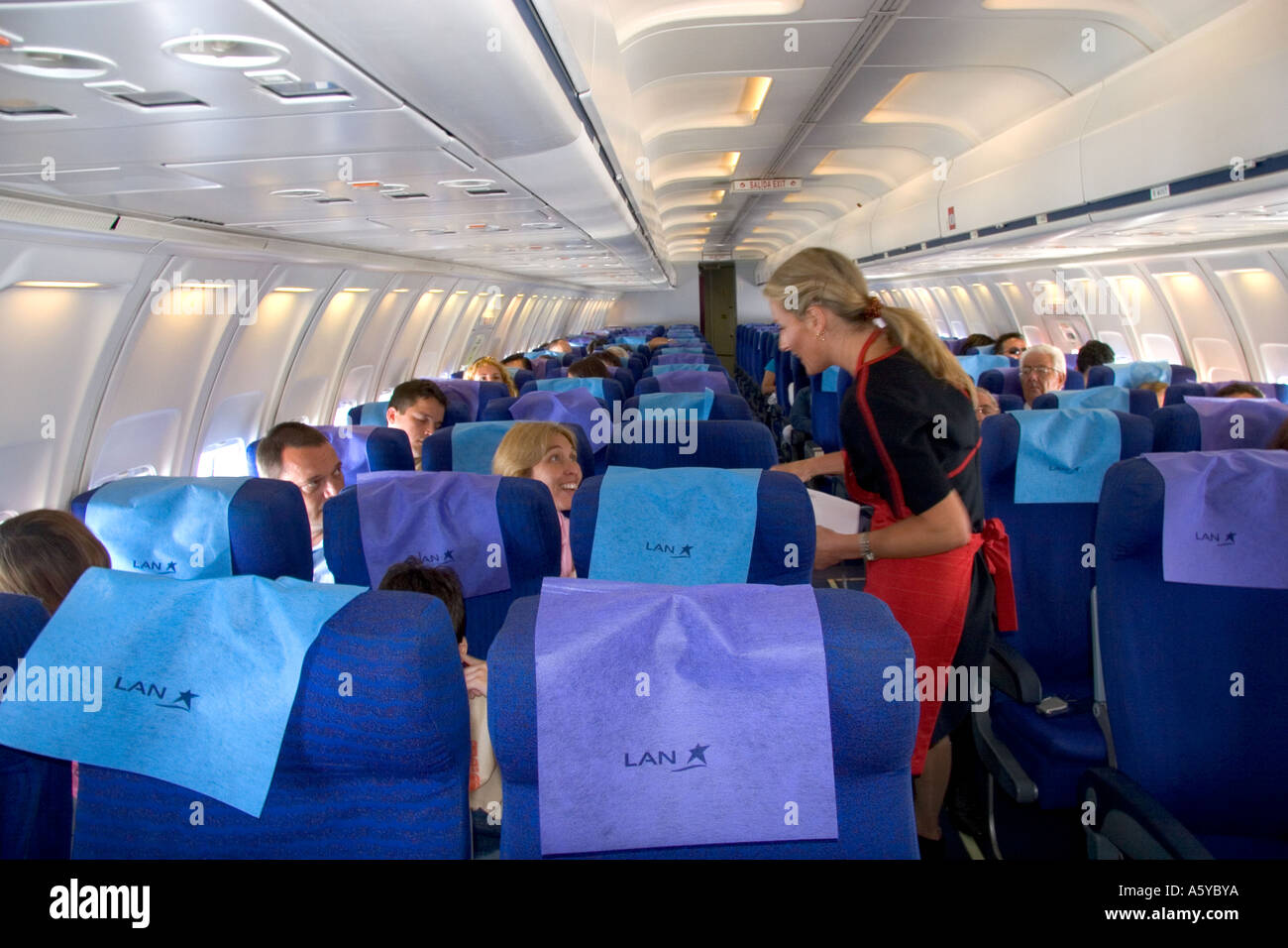 Flight attendant passengers hi-res stock photography and images - Alamy