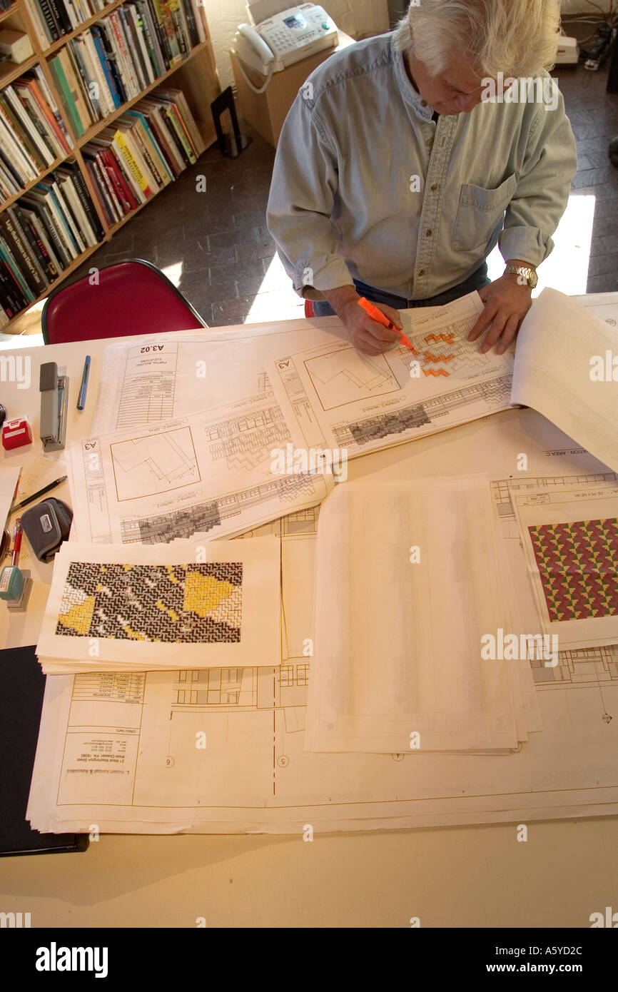 Japanese graphic designer working in his studio Stock Photo - Alamy