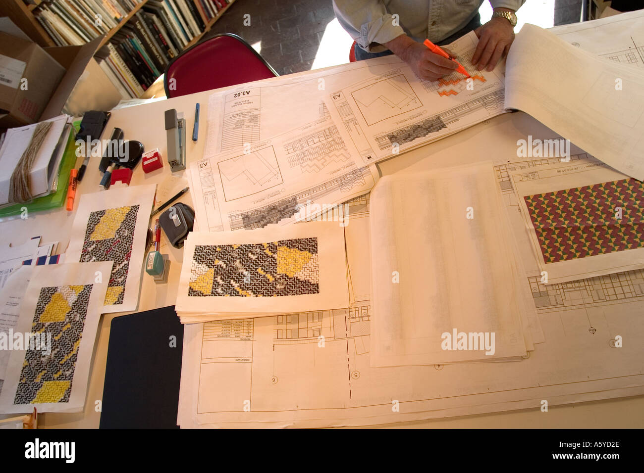Japanese graphic designer working in his studio Stock Photo - Alamy