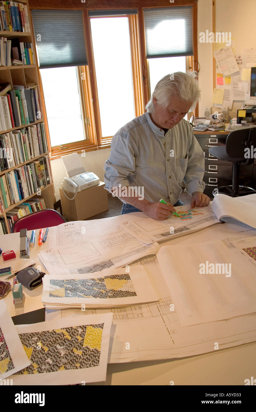Japanese graphic designer working in his studio Stock Photo - Alamy