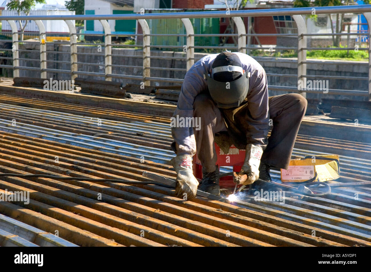 Construction worker welding on a bridge deck in Buenos Aires, Argentina ...