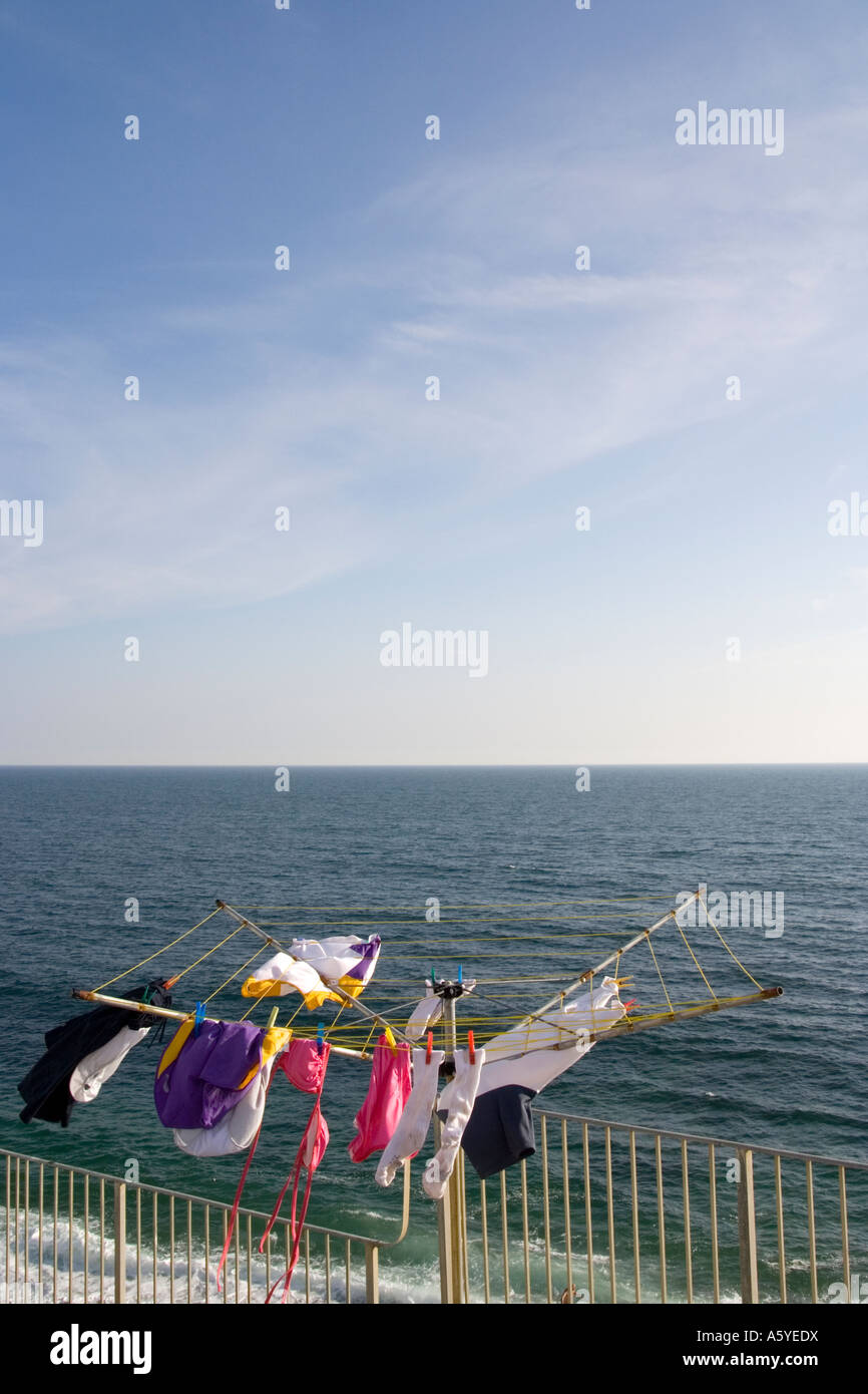 Washing on line with view to sea Stock Photo - Alamy