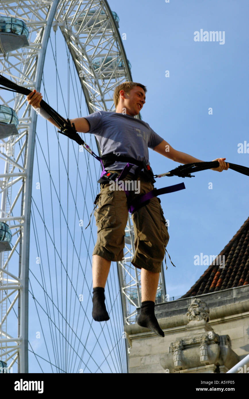 Bungy Jumping in front of the London Eye London England Stock Photo - Alamy