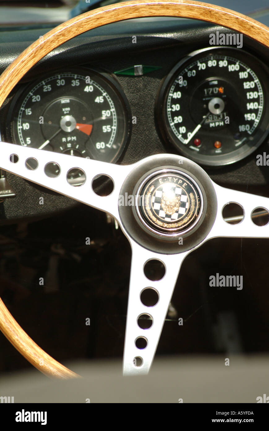 jaguar E type cockpit interior wood sports car dials speedo rev counter ...