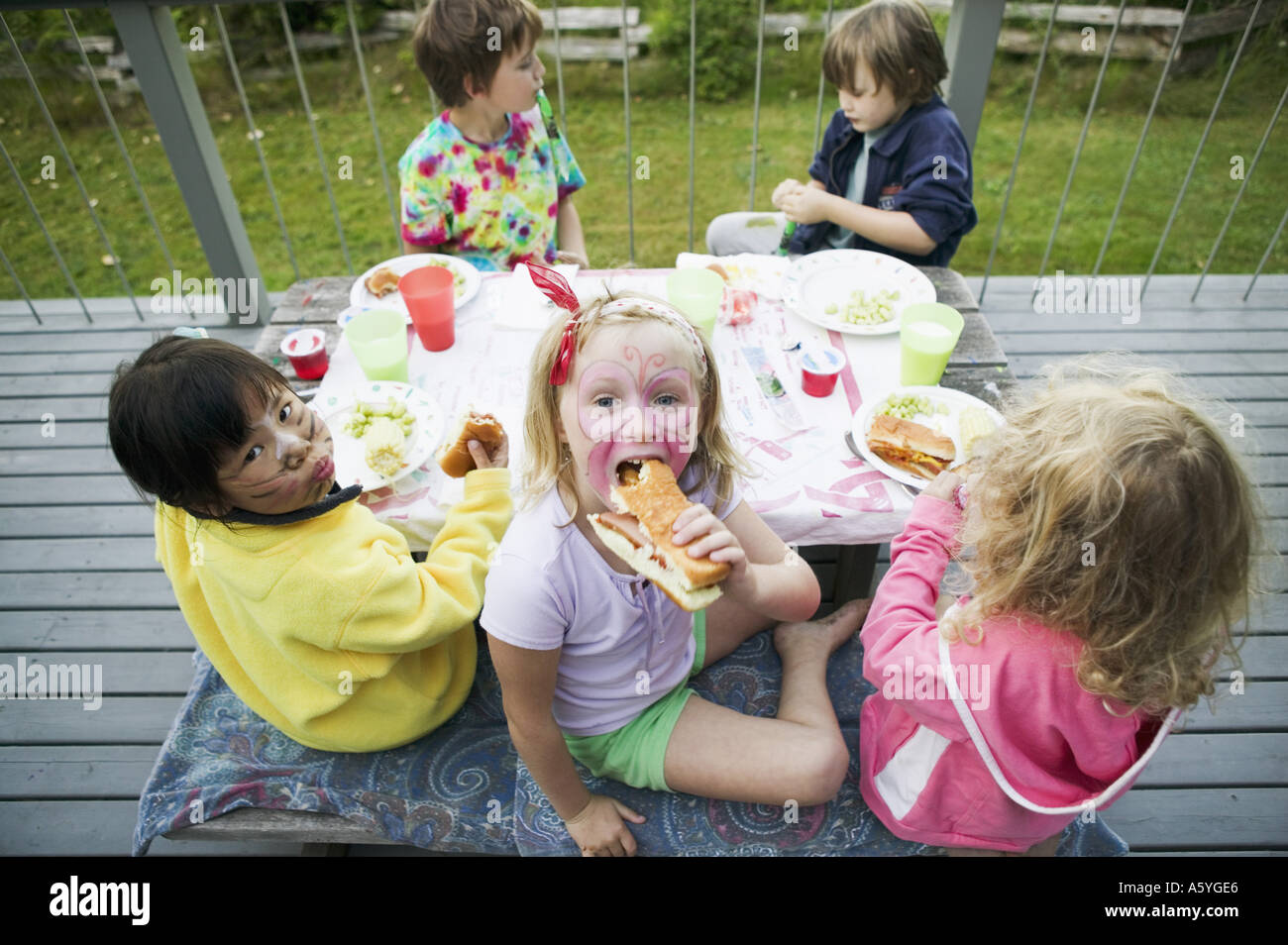 Group young friends eating sandwiches hi-res stock photography and ...