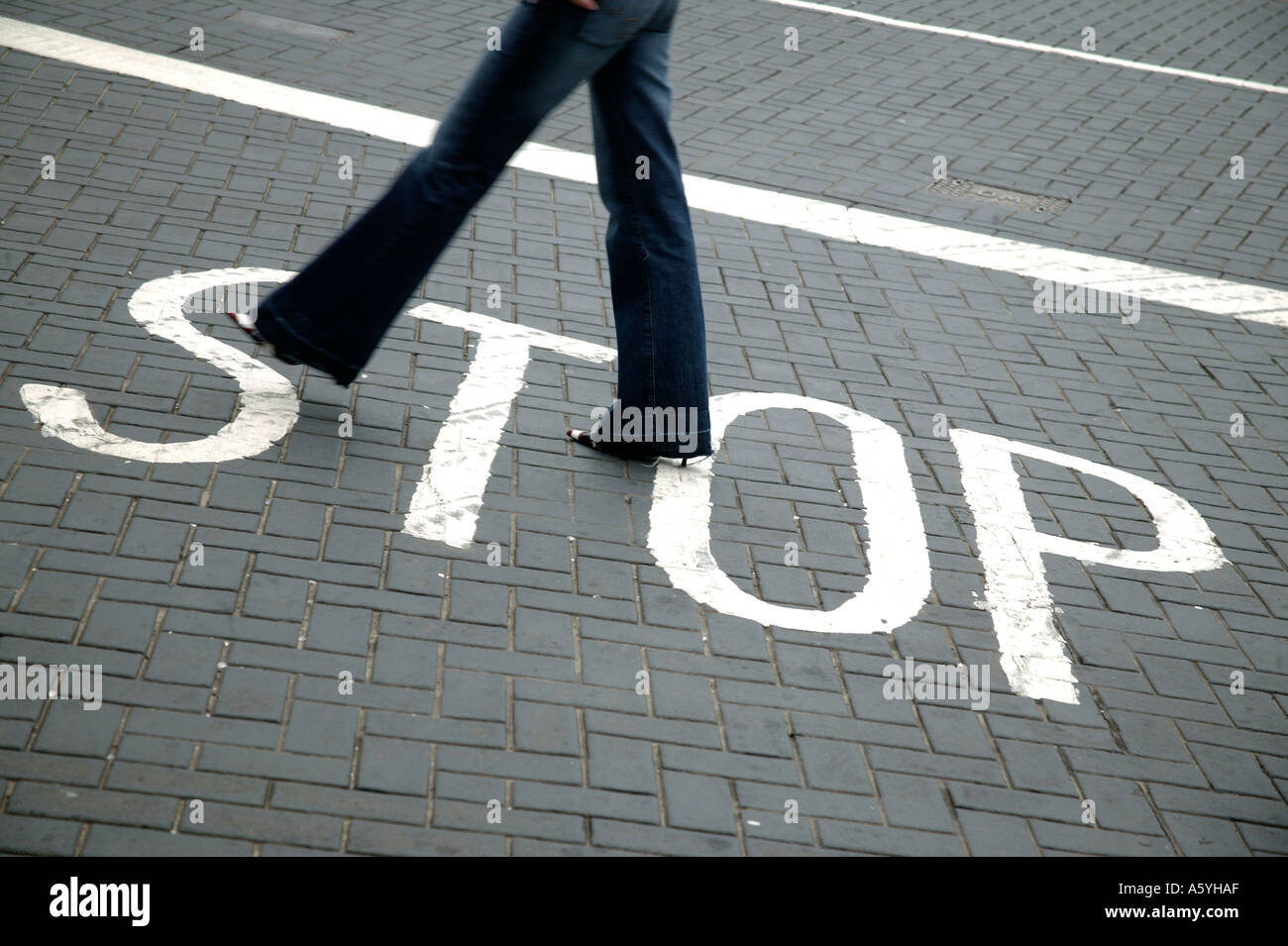 STOP SIGN ON ROAD Stock Photo - Alamy