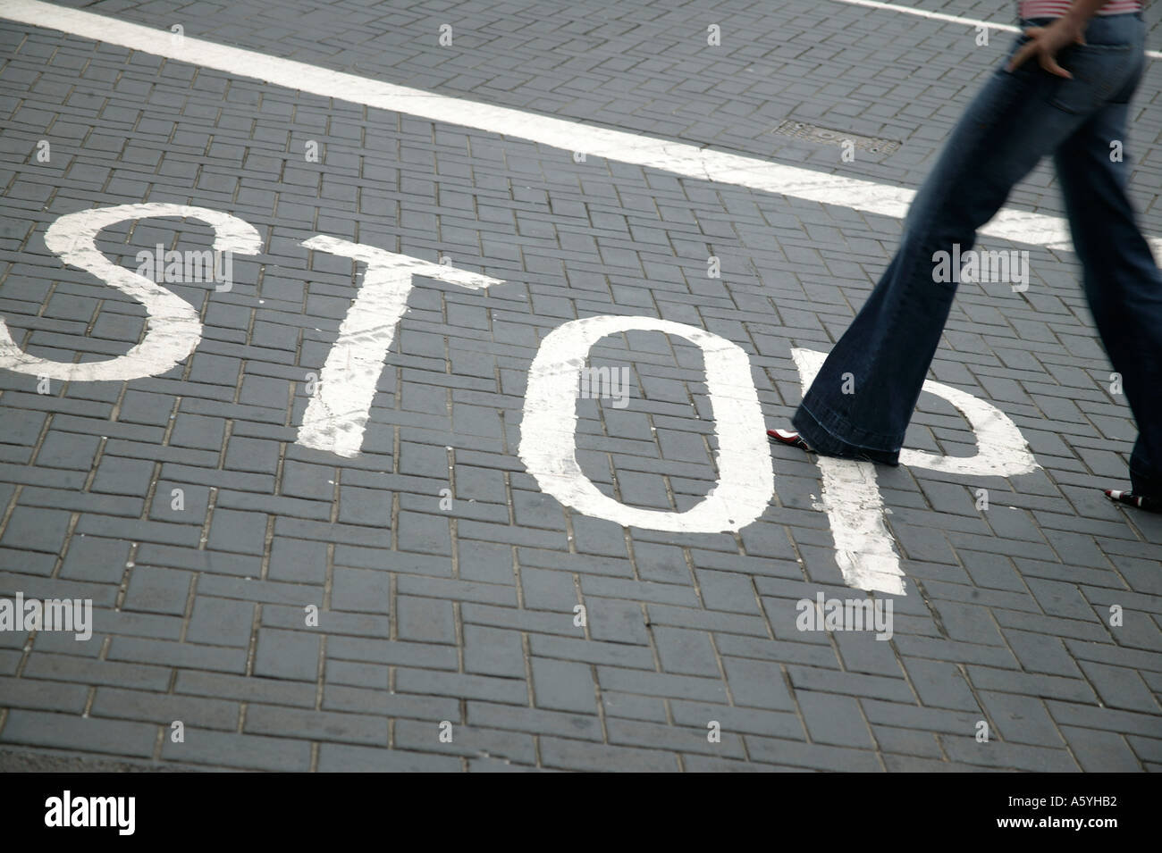 STOP SIGN ON ROAD Stock Photo - Alamy