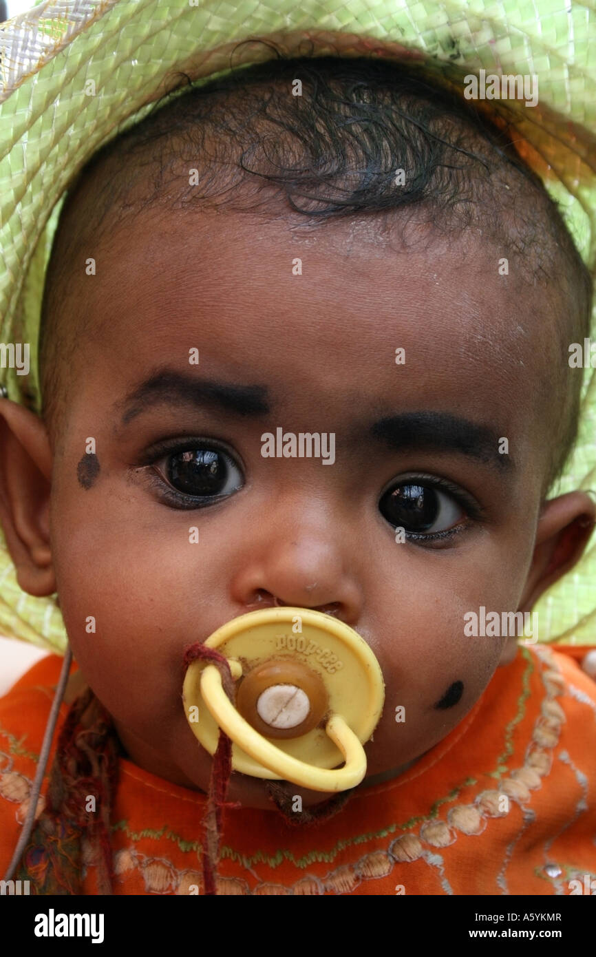 Indian Baby with old dummy , Bangalore , Karnataka , India Stock Photo ...
