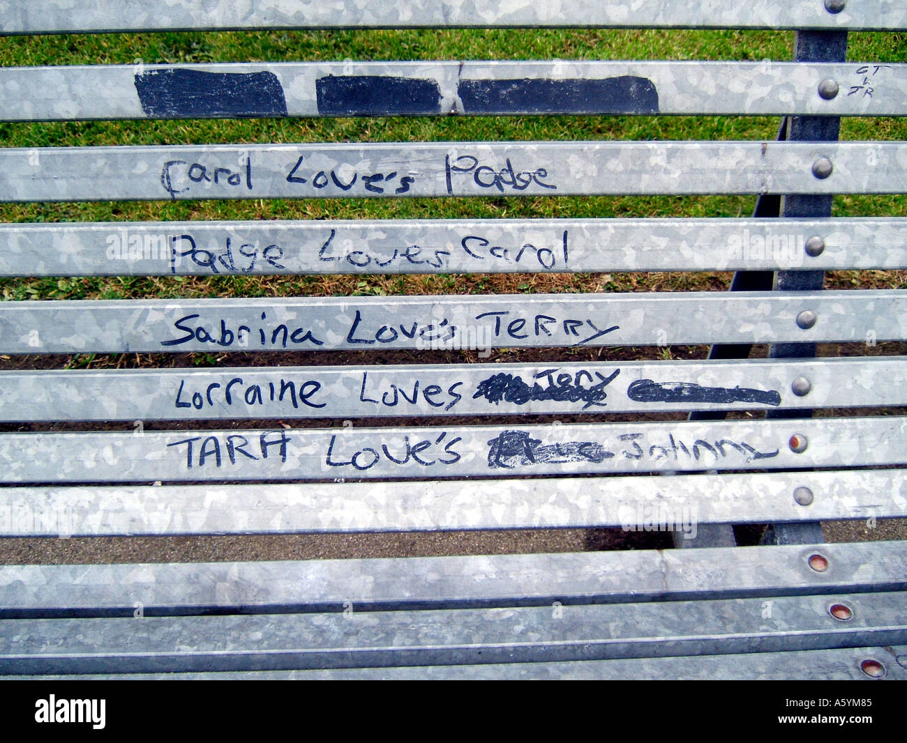 writing on park bench Stock Photo - Alamy