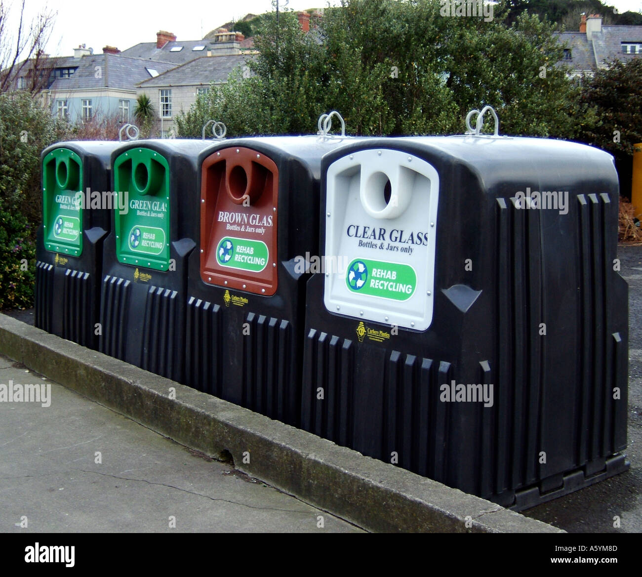 row of bins for recycling household waste Stock Photo - Alamy