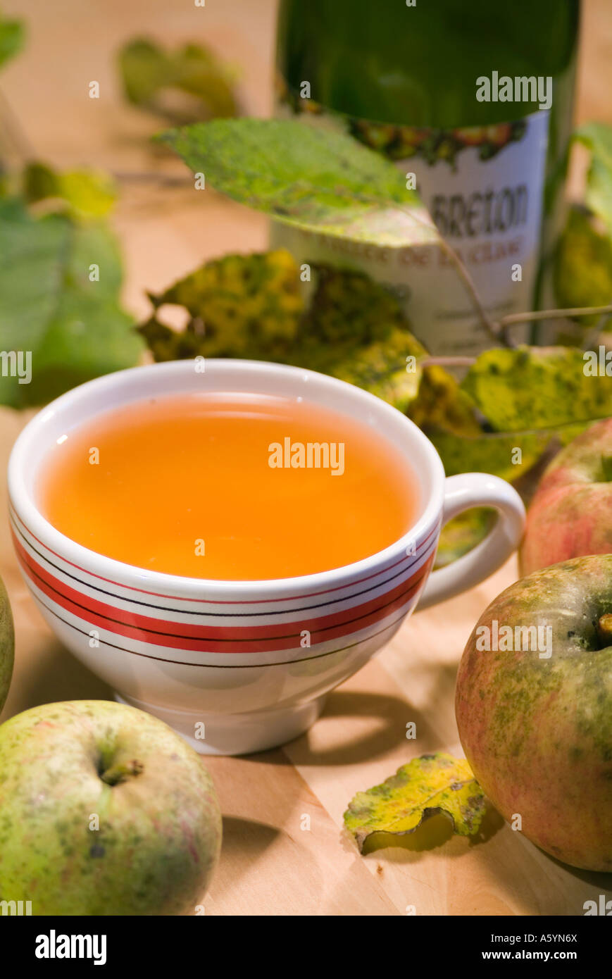 cup of cidre cider and bio organic apples and a bottle of cider ...