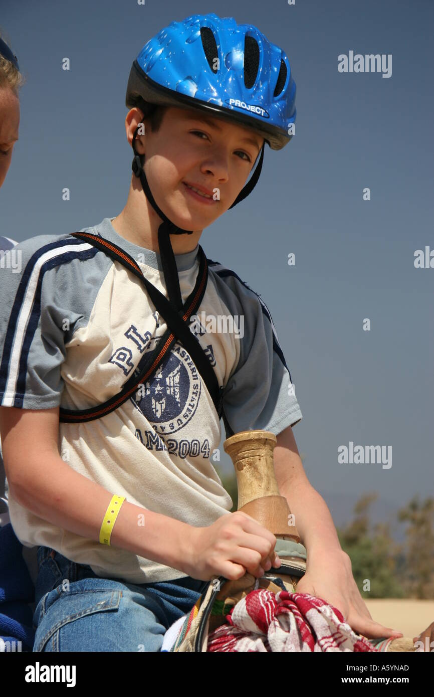 hippo therapy with camel / camel riding Stock Photo - Alamy
