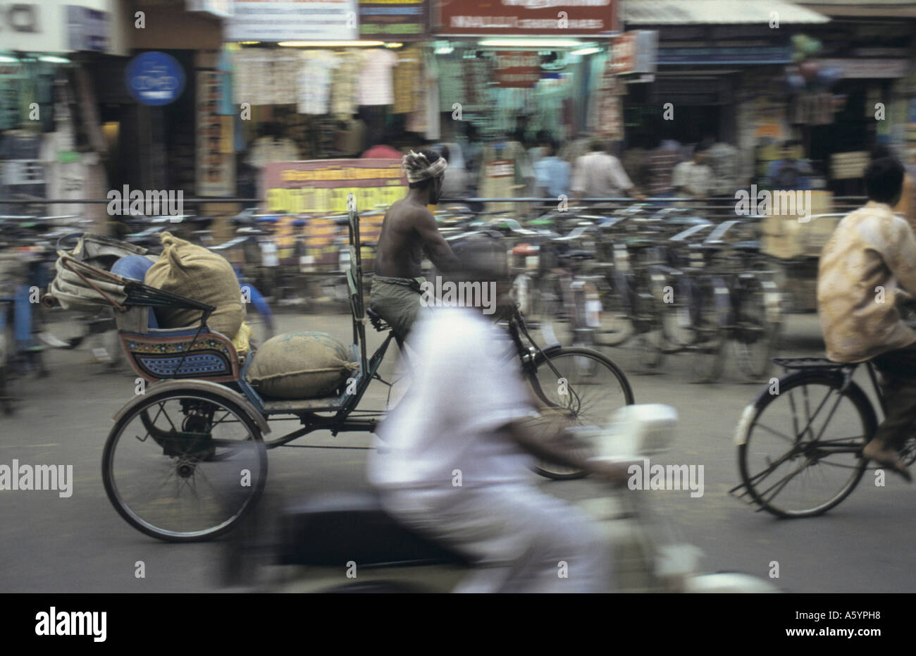 Rickshaw driver carrying goods in cart, Pondicherry, India Stock Photo ...