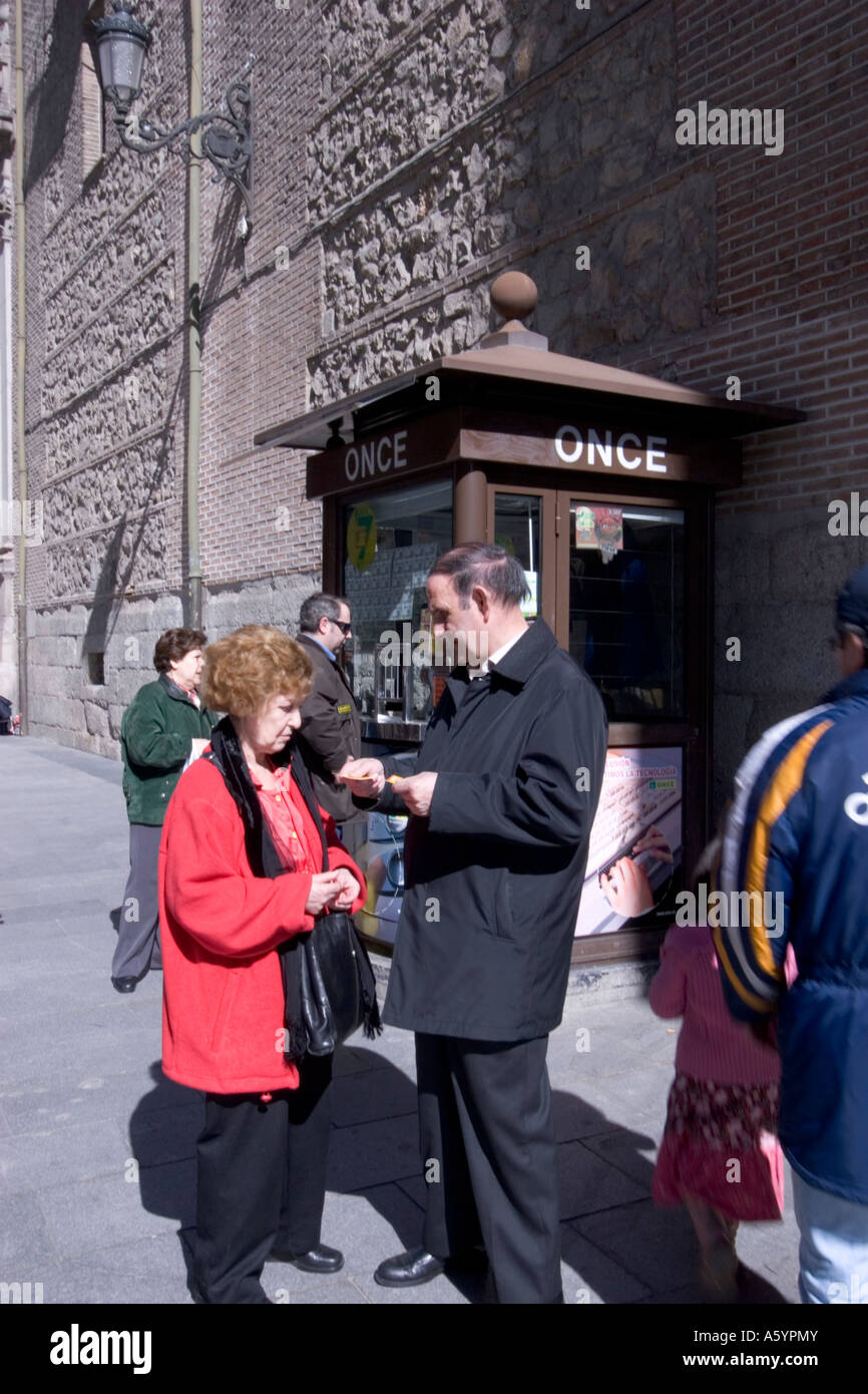 Once lottery booth Spain with queue of lottery ticket buyers Puerta del ...