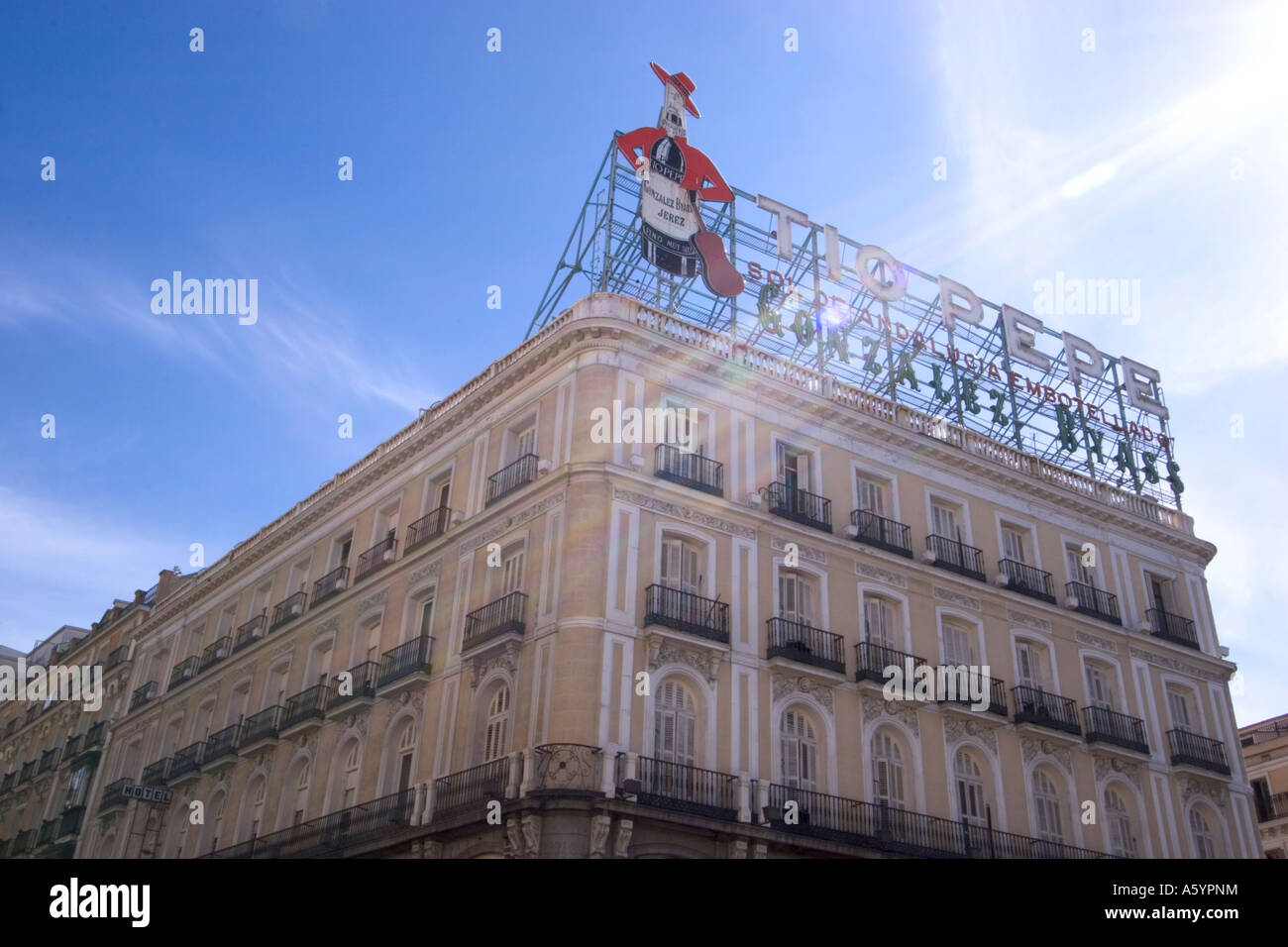 Tio Pepe sign in Sol Madrid, with sun Stock Photo - Alamy