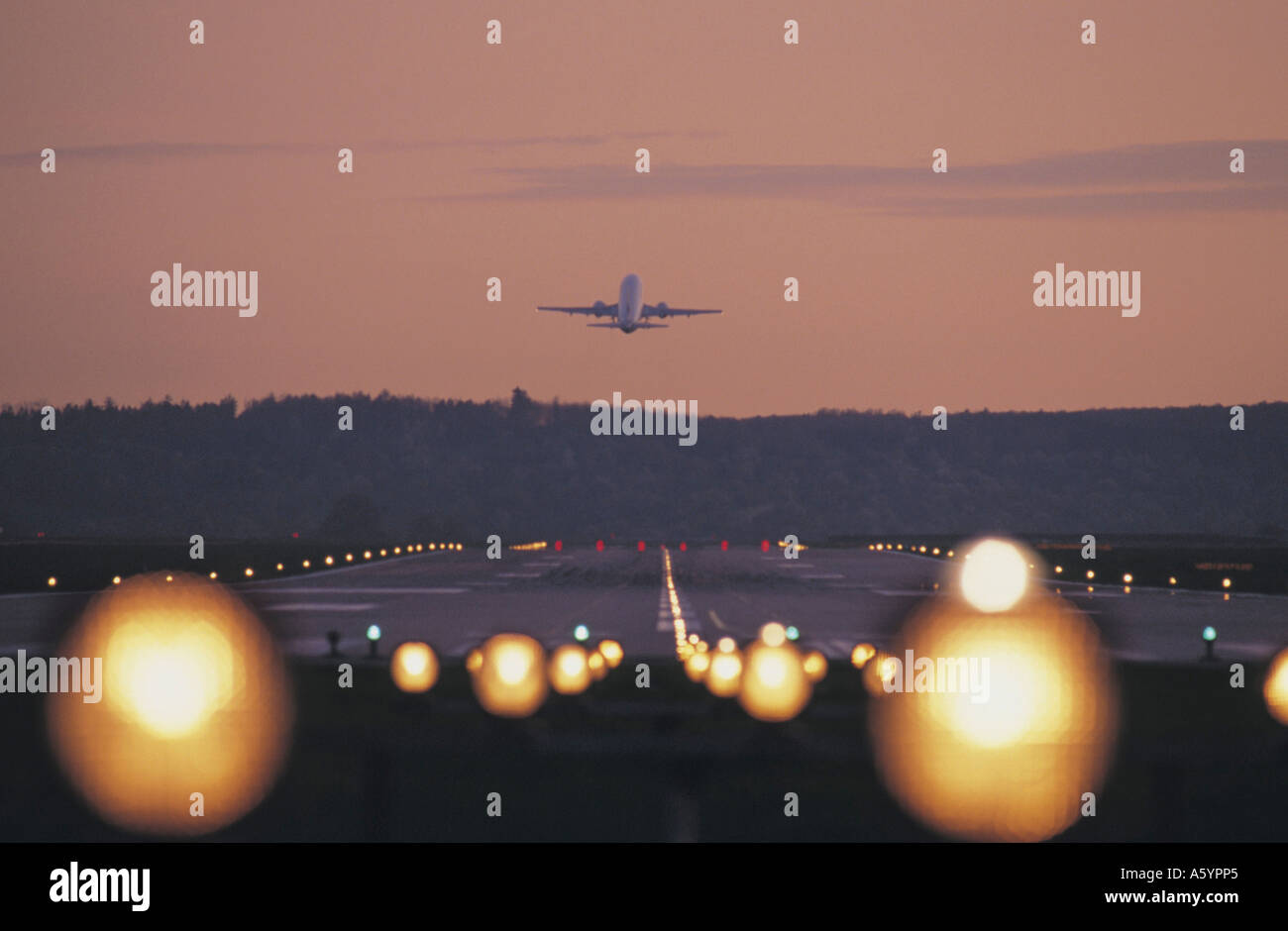 Commercial aircraft taking off Stock Photo - Alamy