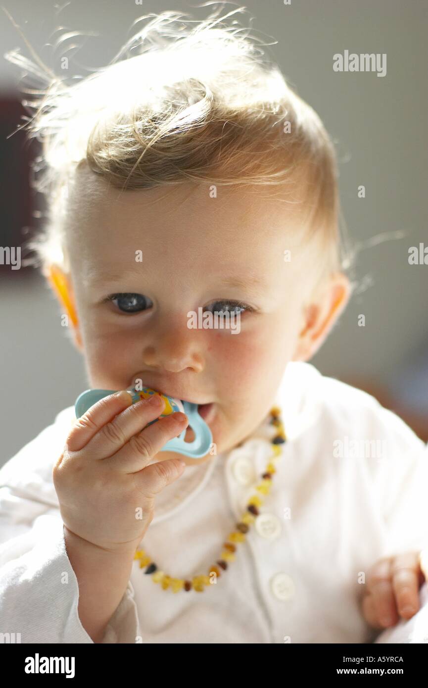 portrait of baby with dummy Stock Photo - Alamy