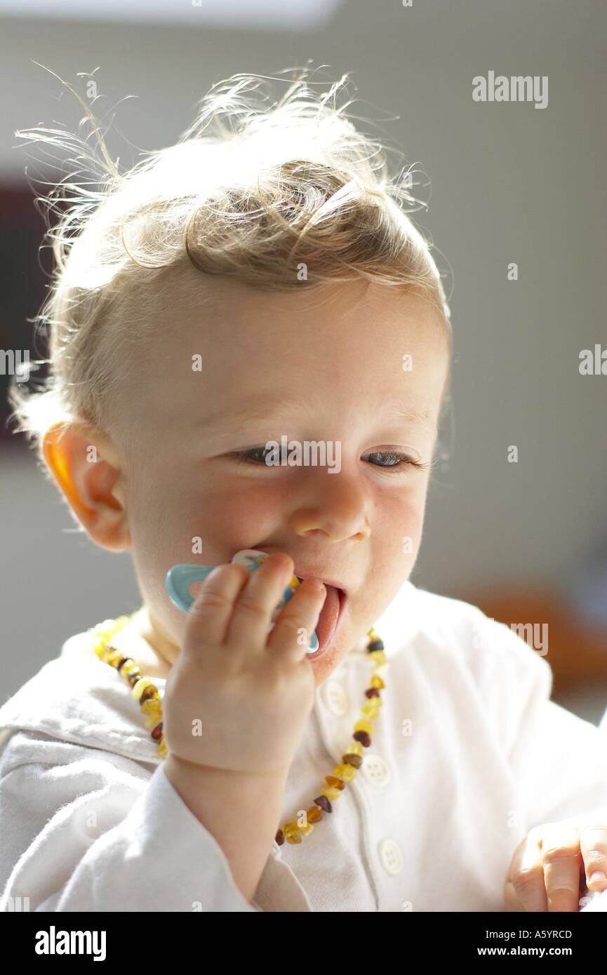 portrait of baby with dummy Stock Photo - Alamy
