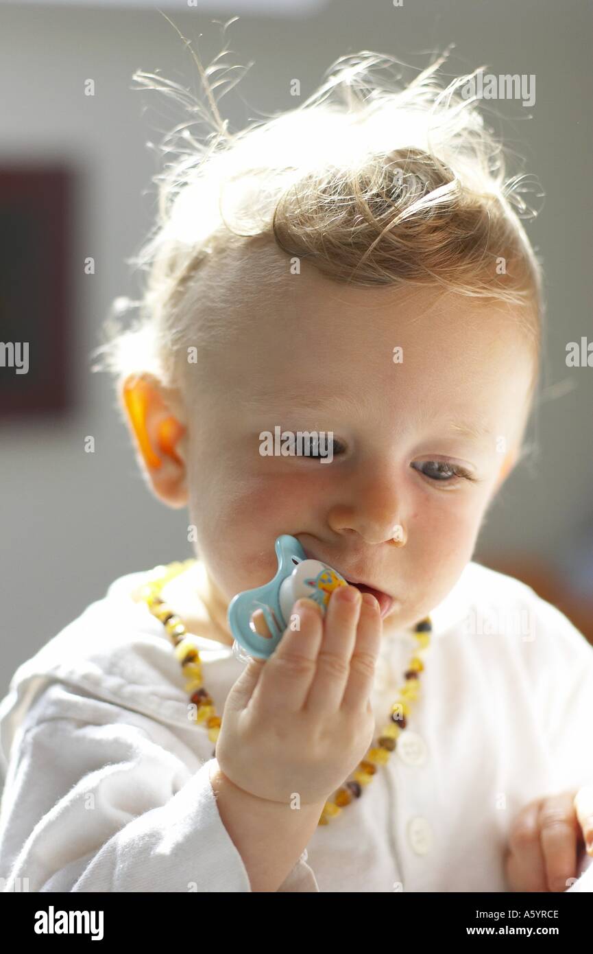 portrait of baby with dummy Stock Photo - Alamy
