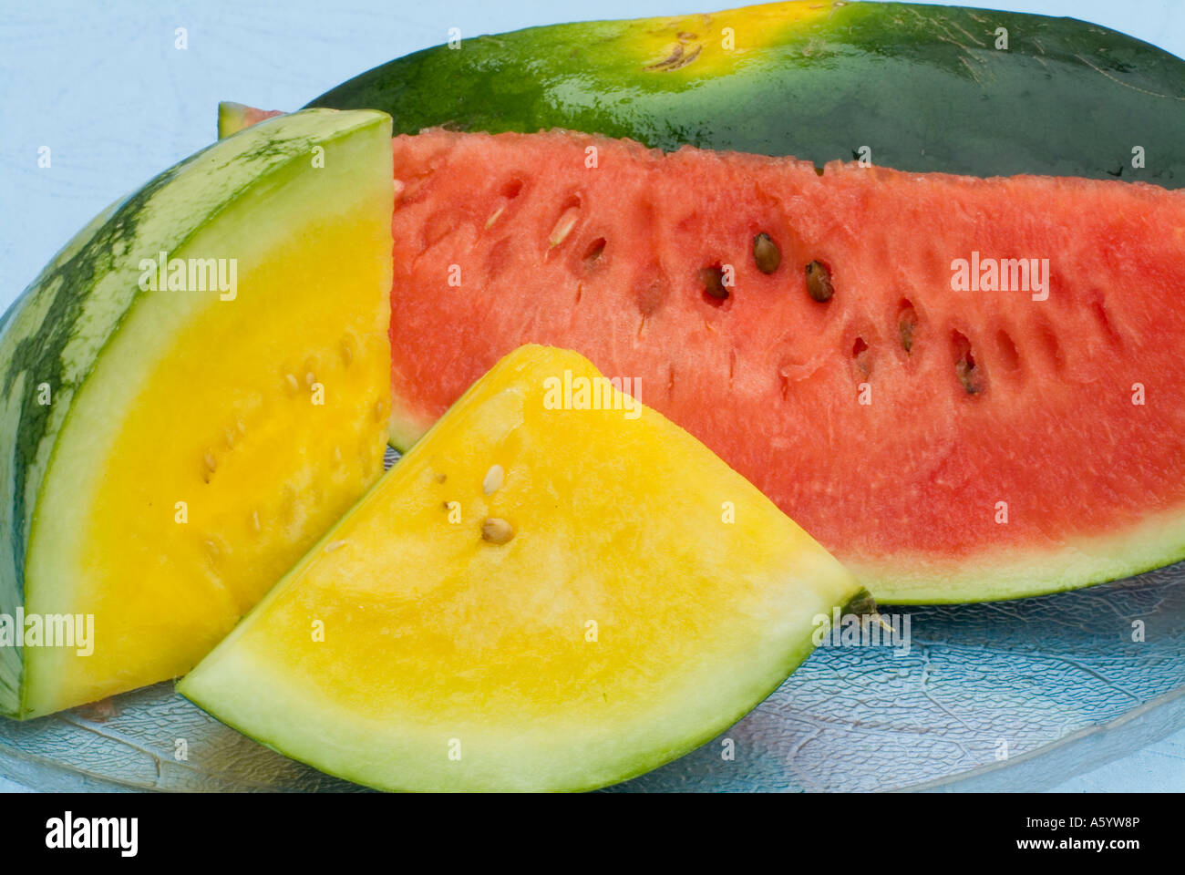 yellow and red sliced water melons watermelons Stock Photo - Alamy