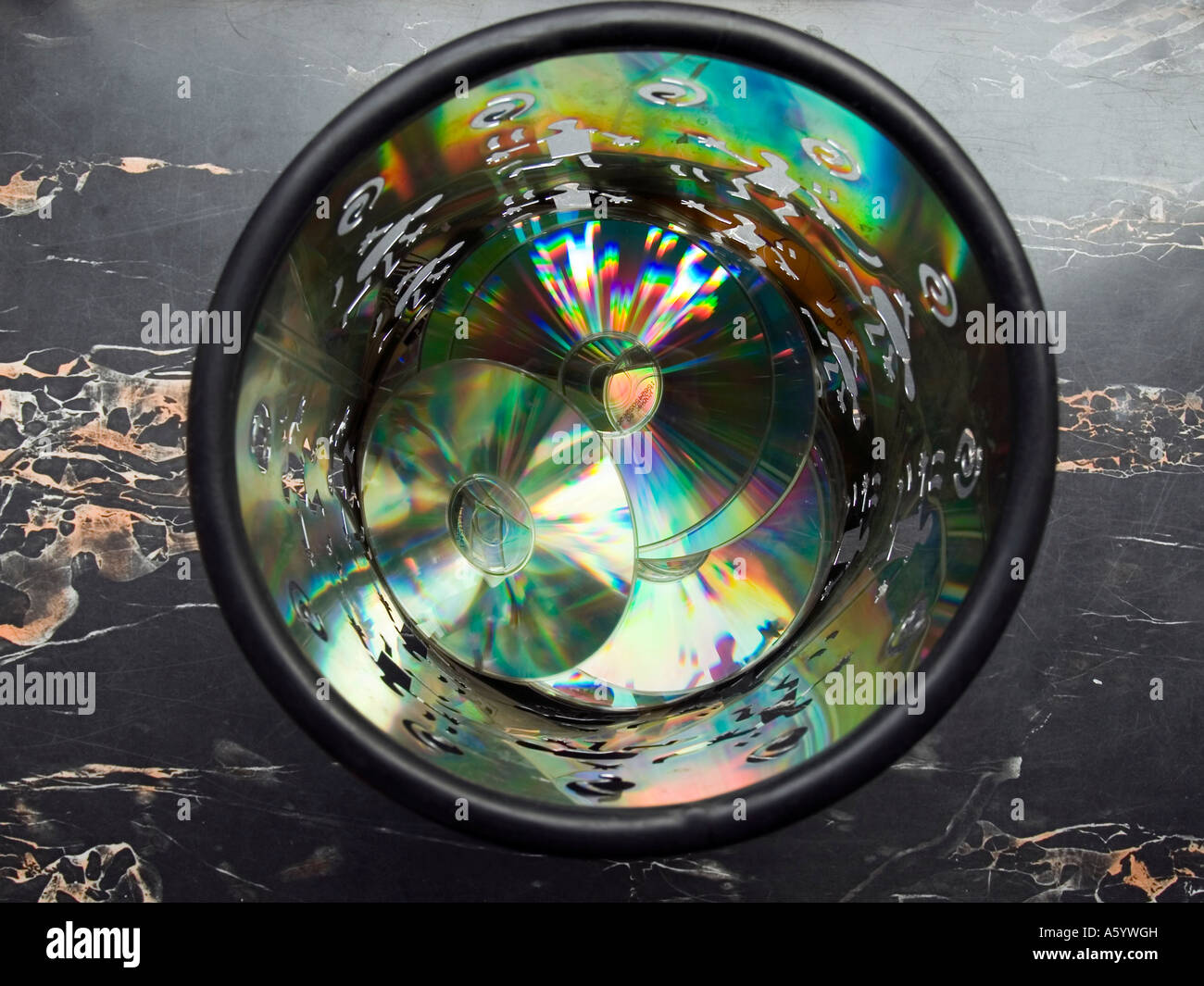 data medium storage CD DVD in a wastebasket Stock Photo - Alamy