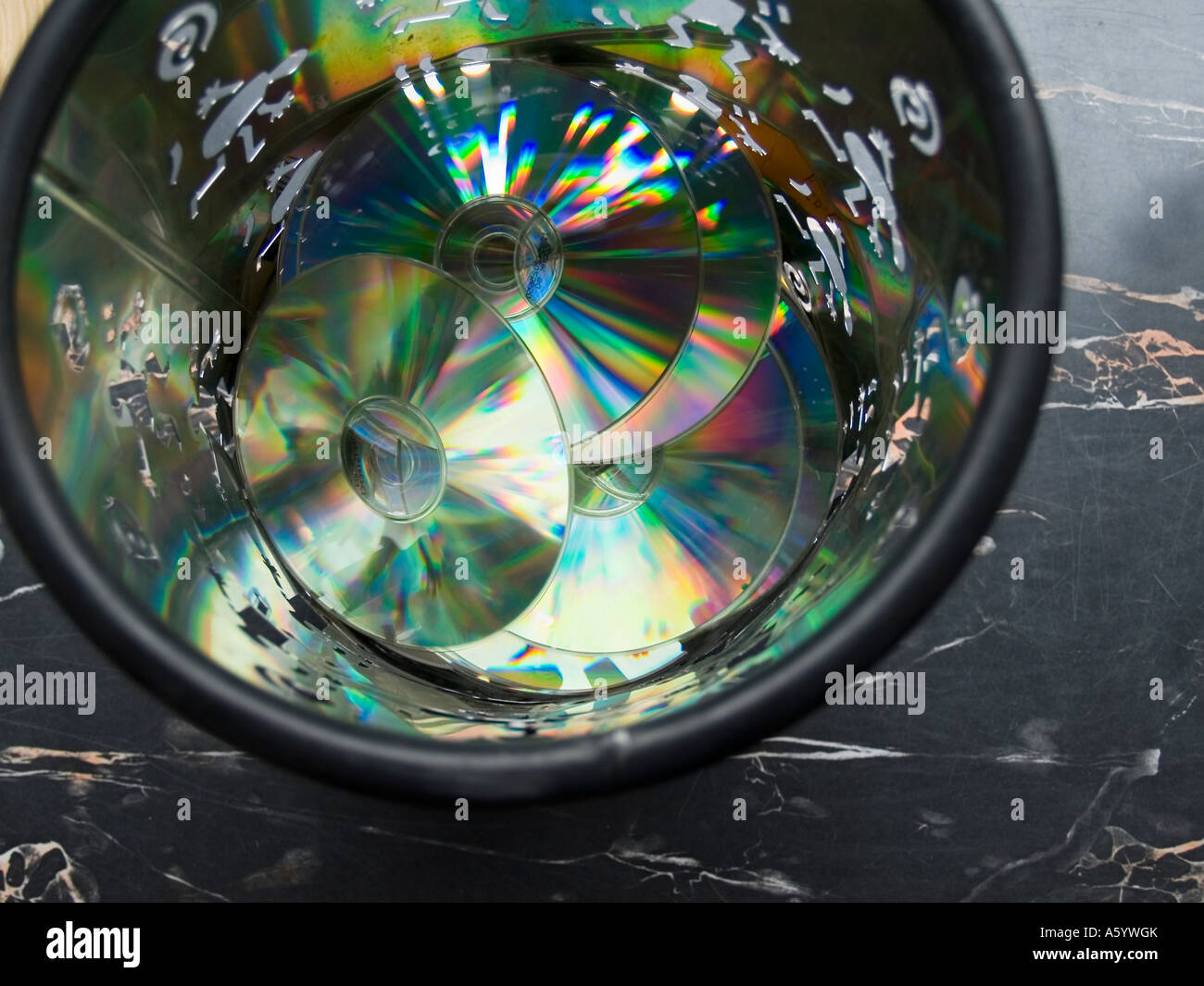 data medium storage CD DVD in a wastebasket Stock Photo - Alamy