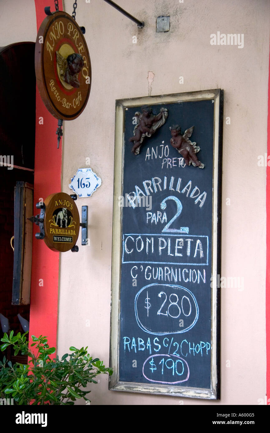 Spanish language sign outside a cafe in Colonia, Uraguay Stock Photo ...