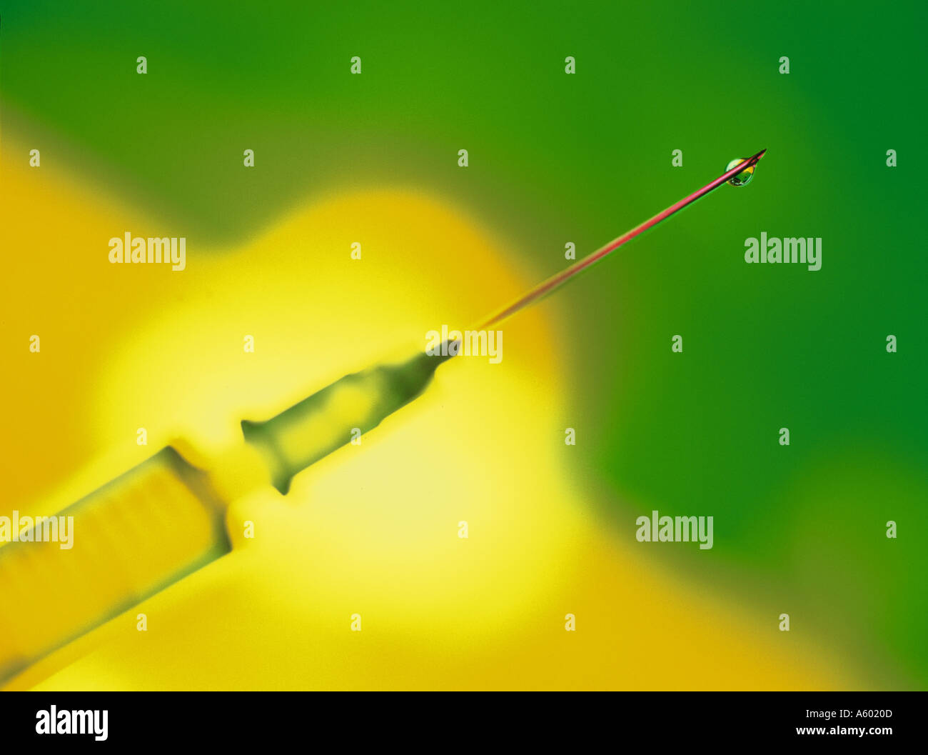 Syringe with drop at the needlepoint Stock Photo - Alamy