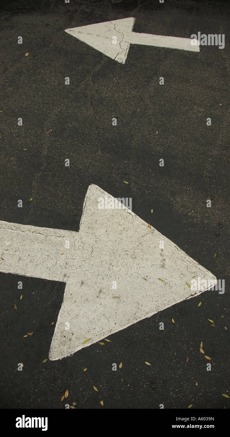 road arrows painted on pavement for traffic directions Stock Photo - Alamy