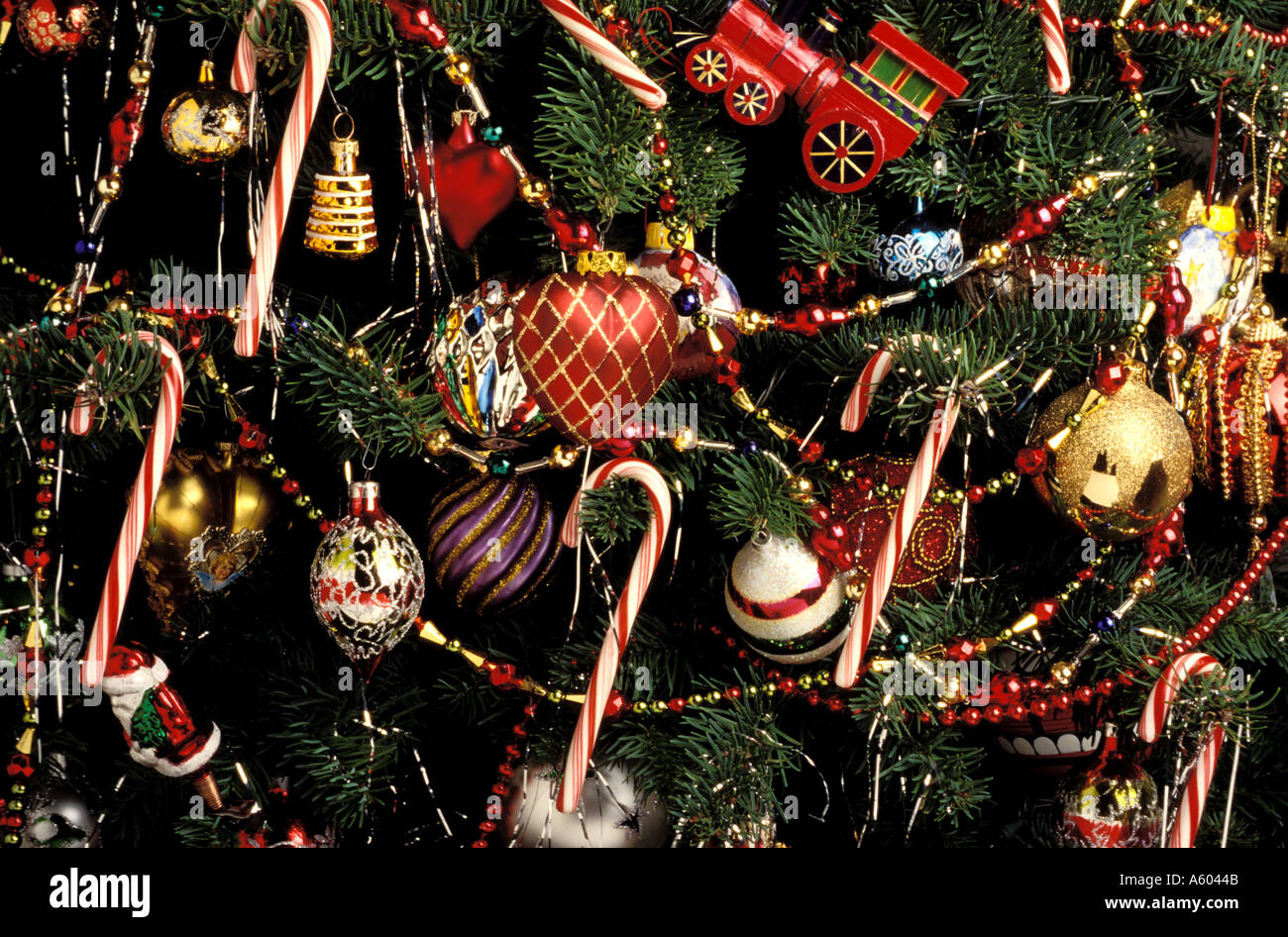 Christmas tree full of ornaments Stock Photo - Alamy