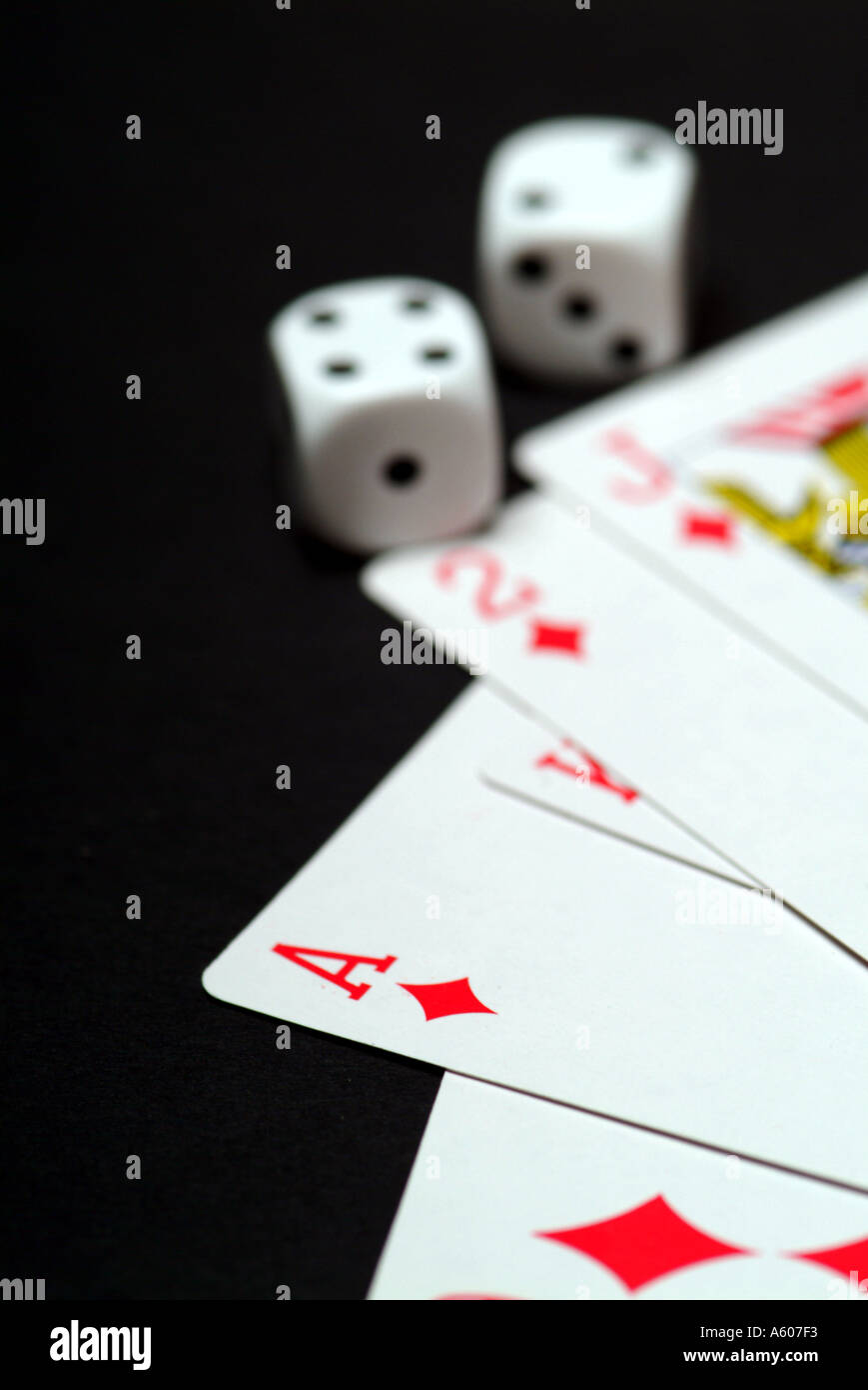 Playing cards and dice Stock Photo - Alamy