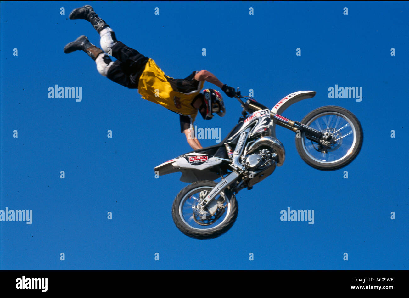 Low angle view of motorcross driver in mid-air jump Stock Photo - Alamy