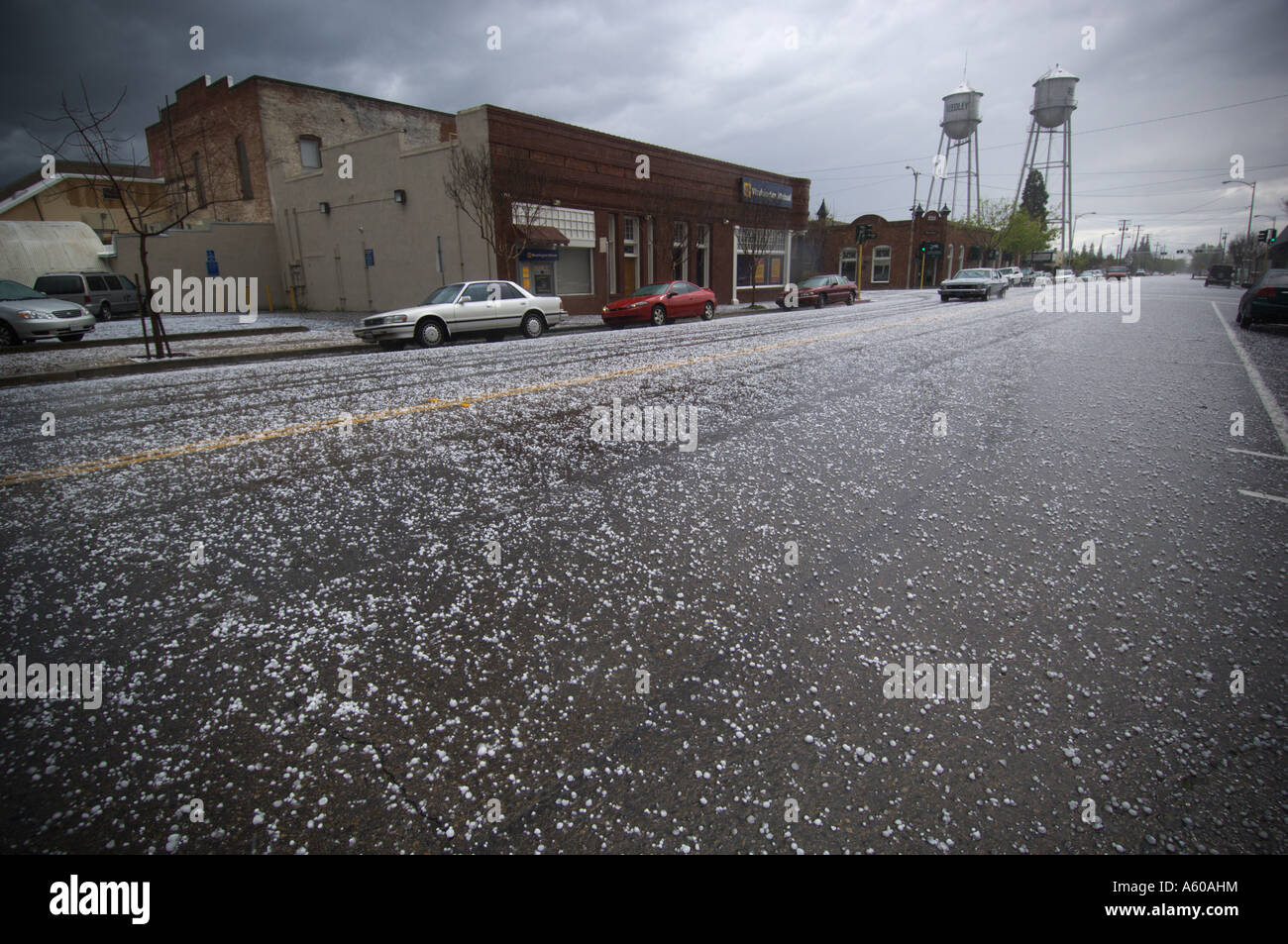 Hail hits the streets of a small town Stock Photo - Alamy