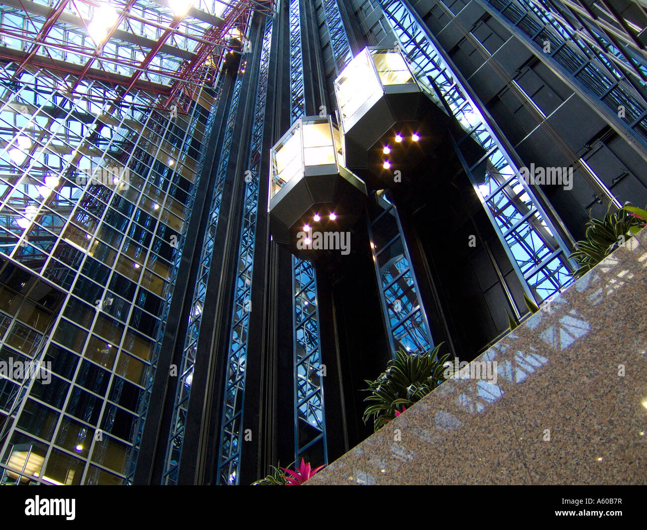 modern lifts in the atrium of the Express headquarters in London Stock ...
