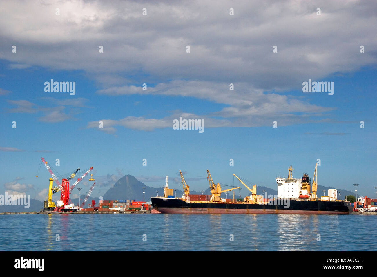 Container ship in the harbor at Papeete on the island of Tahiti Stock ...