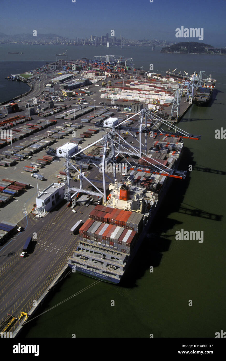 aerial view of container ship docked at Port of Oakland California San ...