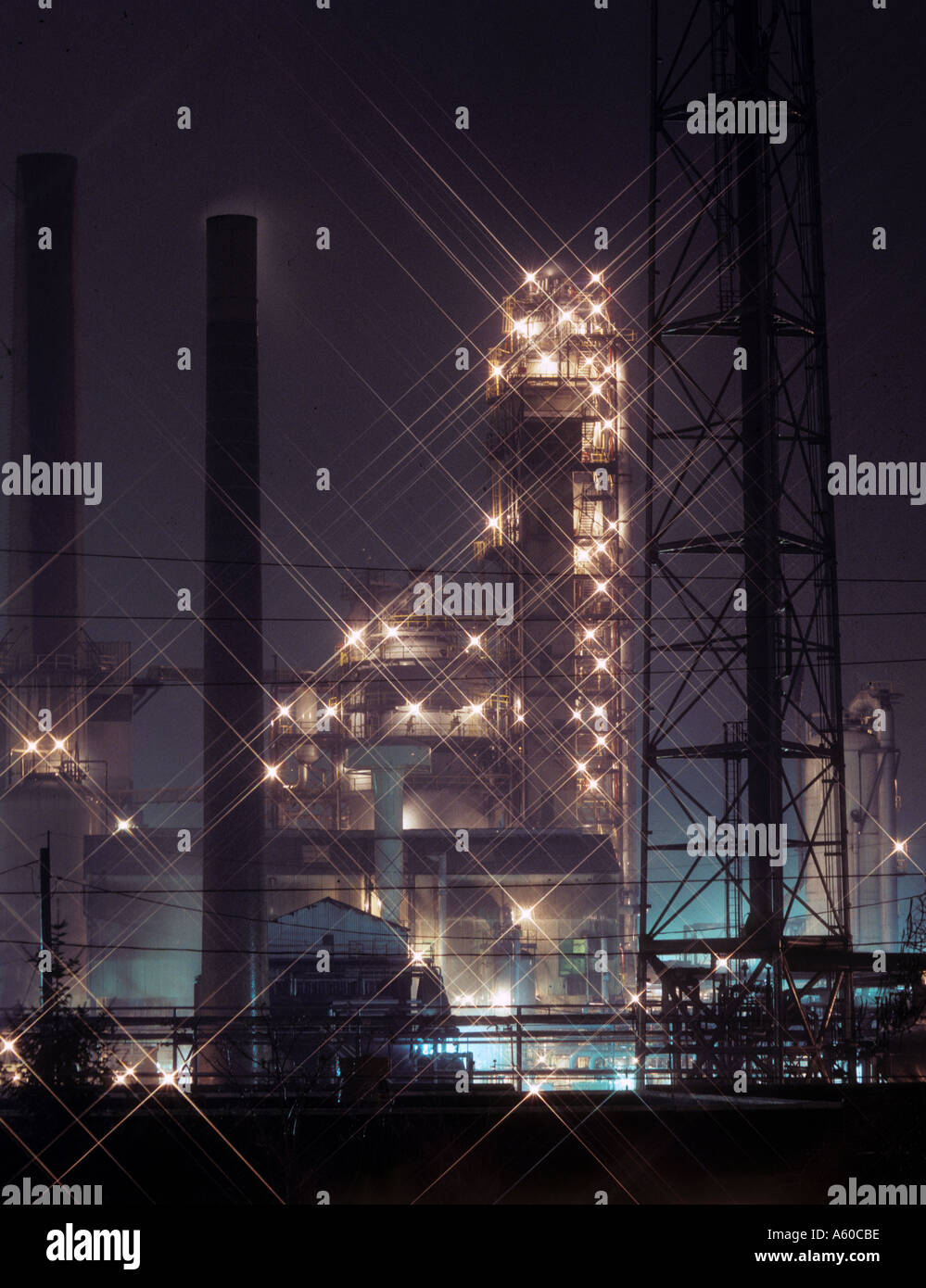 oil refinery lighted at night Stock Photo - Alamy